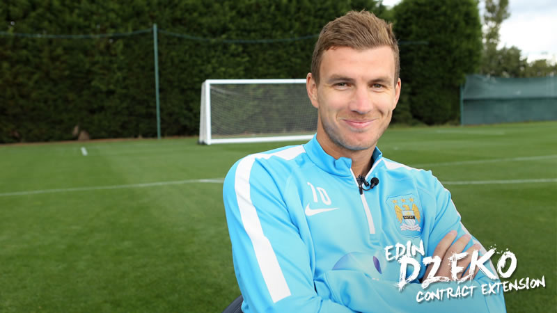 Dzeko signs four-year deal at City